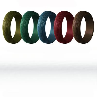 China Convex Bark Texture Silicone Wedding Bands with Channel Setting Inlay - Workout Rings in Multiple Colors and Sizes for sale