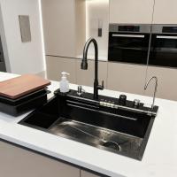 China Stainless Steel Kitchen Sink 900mm×550mm with Integrated Faucet for sale