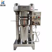 China Oil Production Line Essential 10kg Per Batch Hydraulic Cocoa Liquor Butter Press Expeller Walnut Oil Extraction Machine for sale