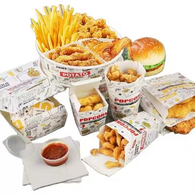 China Custom Printed Kraft Clamshell Hamburger Box 180x120x80mm Eco Friendly Fries Packaging with Logo for sale