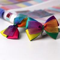 China Girls Christmas Hair Bow Accessories with Rainbow Satin Ribbon and Organza Material for sale