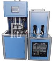 China Semi Auto PET Blow Molding Machine 700BPH 2 Cavity 0-2L Wide Neck Bottle Maker for sale