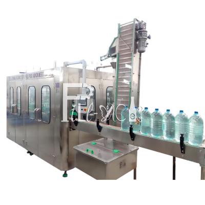 China 3L 5L 10L Plastic Bottle Water Filling Machine 3 in 1 1500BPH Mineral Water Filling Equipment for sale
