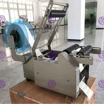 China Semiauto 50BPH Self Adhesive Labeling Machine with Code Printer for Round Bottles 10-150mm for sale
