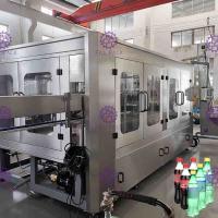 China PLC Control 3-in-1 Carbonated Drink Filling Machine for 0.3L-2L PET Bottles with 8000-12000 BPH Capacity for sale