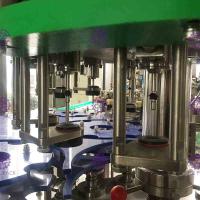 China Automatic Beer Filling Machine 330ml Glass Bottle with Plastic Ring Pull Cap - 3000-4000 BPH Capacity for sale