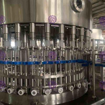 China 5L Pure Water Bottle Filling Machine 3 in 1 Liquid Filler 3000-15000 BPH for sale