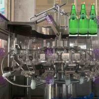 China Monoblock 3-in-1 Beverage Bottle Filler Machine with PLC Control and Touch Screen, 10,000 BPH Capacity for 250-1500ml Bottles for sale