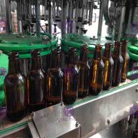 China Automatic Glass Bottled Beer Filling Machine - 4000-5000 BPH Capacity, 24 Filling Heads, Balanced Pressure Monoblock Design for sale