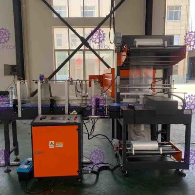 China 5000BPH Mineral Water Bottle Shrink Packing Machine - 16 Bags/Min Capacity, 20kW Power, PLC Control System for sale