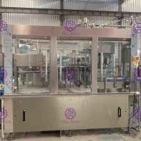 China DCGF40-40-12 Carbonated Drink Filling Machine - 10,000 BPH Capacity for 0.25-2.5L PET Bottles with PLC Control for sale