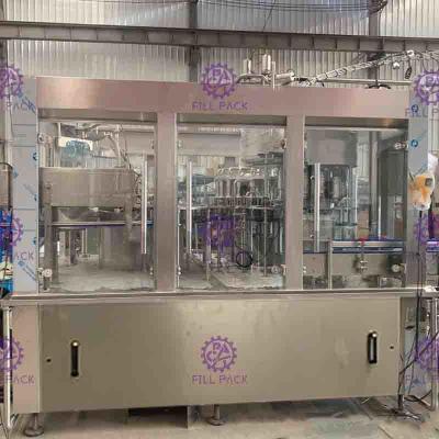 China DCGF40-40-12 Carbonated Drink Filling Machine - 10,000 BPH Capacity for 0.25-2.5L PET Bottles with PLC Control for sale
