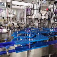 China Carbonated Beverage 3-in-1 Monobloc Glass Bottle Filling Machine 12-12-4 Heads 1000-2000 BPH for sale