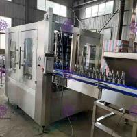 China Carbonated Beverage 3-in-1 Monobloc Glass Bottle Filling Machine 12-12-4 Heads 1000-2000 BPH for sale