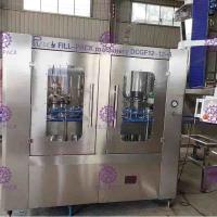 China Carbonated Beverage 3-in-1 Monobloc Glass Bottle Filling Machine 12-12-4 Heads 1000-2000 BPH for sale