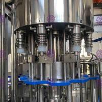 China Automatic 3-in-1 PET Bottle Filling Machine 10000-15000BPH Capacity with PLC Control for sale