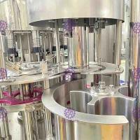China Automatic Monoblock 6000BPH 3-in-1 Milk Filling Machine with 24 Heads and 4KW Power for sale