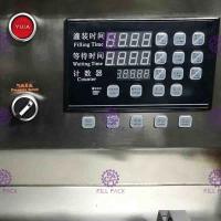 China Semi Automatic Stand Up Pouch Water Filling Machine Desktop 10 Nozzles 500ml 220V for sale