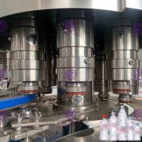China Full Auto Mineral Water Filling Machine 8000 BPH with 32 Filling Heads and 3.0T Weight for sale