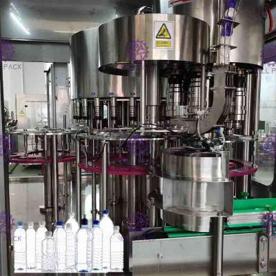 China Monoblock Drinking Water Filling Machine 3 in 1 Washing Filling Sealing 15000bph 0.2-2L for sale