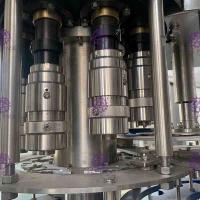 China 3-In-1 Drinking Water Filling Machine PLC Control Monoblock 24 Heads 8000-12000 BPH for sale