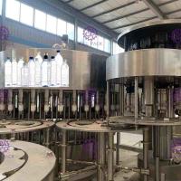 China Top Covered Stainless Steel PET Bottle Water Filling Machine 15000BPH 32 Heads PLC for sale