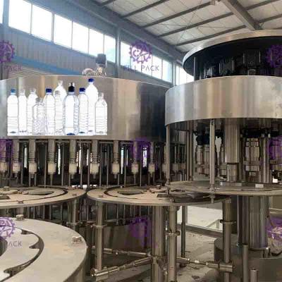China Top Covered Stainless Steel PET Bottle Water Filling Machine 15000BPH 32 Heads PLC for sale