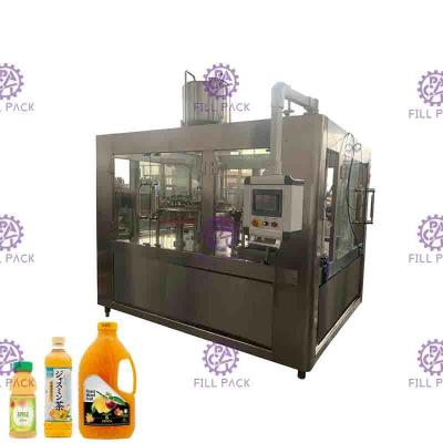 China 5000BPH Monoblock Hot Filling Machine 3 in 1 for Plastic Bottle Juice Filling and Capping for sale