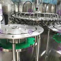 China Automatic 4 in 1 PET Bottle Juice Filling Machine 3000 BPH Monoblock for Granule Pulp Beverages for sale