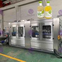 China Full Auto 8000BPH Glass Bottle Fruit Juice Filler with PLC Touch Screen Control for sale