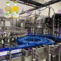 China Full Auto 8000BPH Glass Bottle Fruit Juice Filler with PLC Touch Screen Control for sale