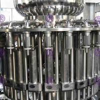 China PLC Controlled Plastic Bottle Juice Filling Machine with Touch Screen - 6000-8000 BPH Capacity for 0.3-2L PET Bottles for sale