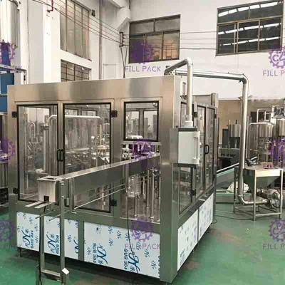 China Automatic 4 in 1 Fruit Juice Filling Machine for PET Bottles 6000-8000 BPH PLC Control for sale