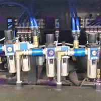 China Automatic 4 Cavity PET Bottle Blow Molding Machine 3200-4000 BPH for sale
