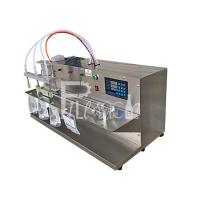 China Semi-Automatic 4 Nozzle Piston Liquid Filling Machine 3500ml Capacity 30 Bags/Min for sale