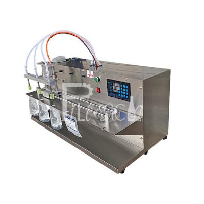 China Semi-Automatic 4 Nozzle Piston Liquid Filling Machine 3500ml Capacity 30 Bags/Min for sale