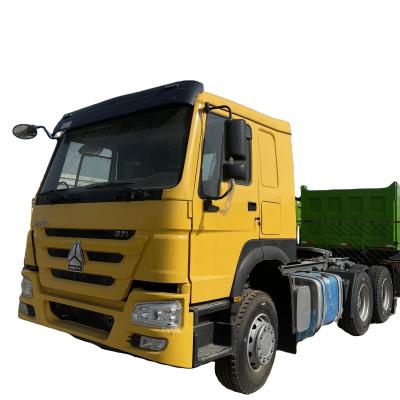 China 10 Tires ABS Supported Sinotruk Tractor Truck , Heavy Howo Tractor Head 6x4 for sale