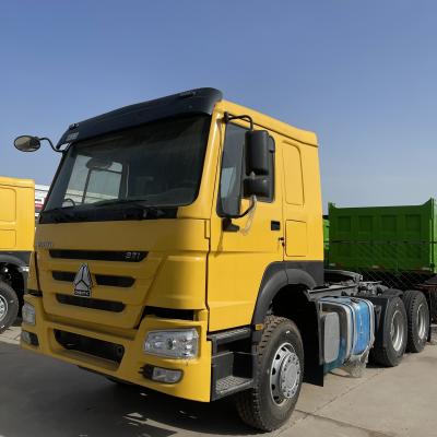 China Howo T7 Tractor Truck With Onsite Installation And Semi Automatic Truck Tractor Head for sale