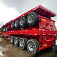 China Xianmang Group 3 And 4 Axles 20ft 40ft Container Flat Bed Flatbed Semi Trailers For Tanzania And Kenya for sale