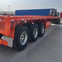 China Custom 3 Axles 4 Axles 40ft 48ft 53ft 60ft Shipping Container Flatbed Semi Trailer For Rwanda And Tanzania for sale
