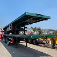China Customizable 2 3 4 Axles 30tons 40 Tons 50 Tons Shipping Container Flatbed Semi Trailer With Tractor Truck for sale