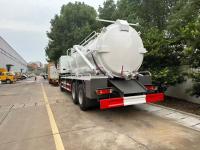 China HOWO Heavy Duty 6 Wheels Sewage Truck 10CBM Tank Volume Red Color Left Hand Driving for sale