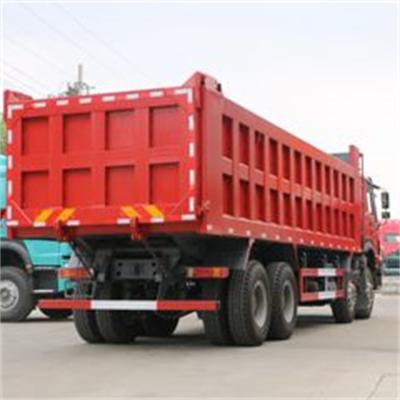 China Howo 8x4 380 Hp Euro II Emission Standard Left Hand Drive Dump Truck for 300L Tank and 9tons Front Axle Loading Capacity for sale