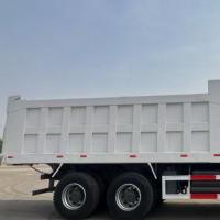 China Customizable White Color HOWO 6X4 375HP Dump Truck Seats≤5 Container Length 5.60 * 2.35 * 1.5mm for Euro 2 Emission Standard for sale