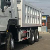 China Customizable White Color HOWO 6X4 375HP Dump Truck Seats≤5 Container Length 5.60 * 2.35 * 1.5mm for Euro 2 Emission Standard for sale
