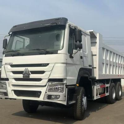 China Customizable White Color HOWO 6X4 375HP Dump Truck Seats≤5 Container Length 5.60 * 2.35 * 1.5mm for Euro 2 Emission Standard for sale