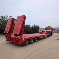 China Low Bed Semi-Trailer with 3 Axis Hydraulic Ladder and Automatic Ramps 40T-100T Load Capacity in South Africa for sale