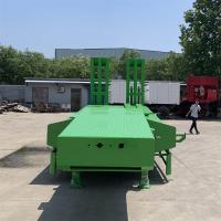 China 3-Axle 60t Dump Semi-Trailer with Hydraulic Ramp Low Bed Trailer and 4/5/6mm Thick Grid Plate for sale