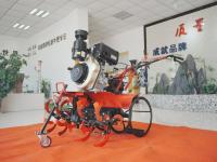 China 115 KG Load Four-wheel Drive Mini Power Tiller Cultivator with All Gear Transmission for sale
