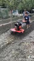China Four-Wheel Drive Paddy Field and Land Cultivation Machines with Gasoline Drive Mode for sale
